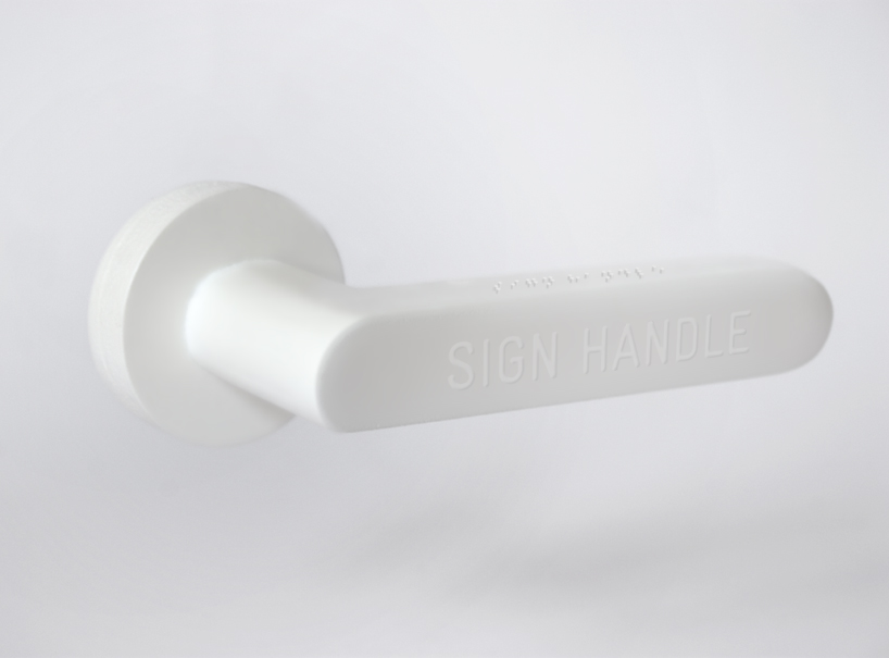 SIGN HANDLE | designboom.com