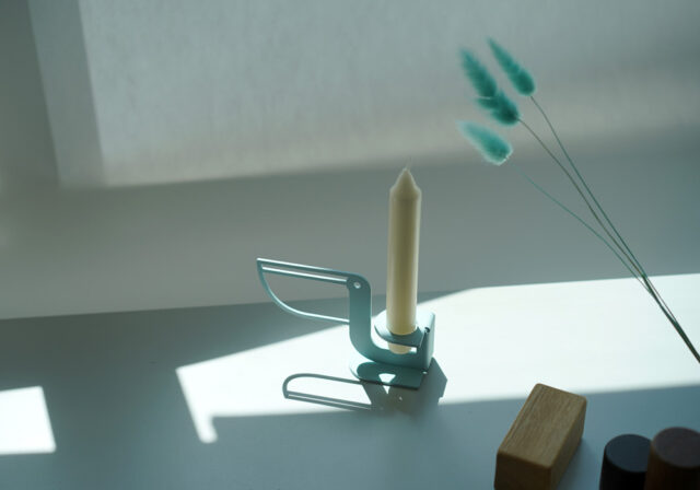 Flying Candle: A romantic firebird candle holder with an origami-inspired steel design ...