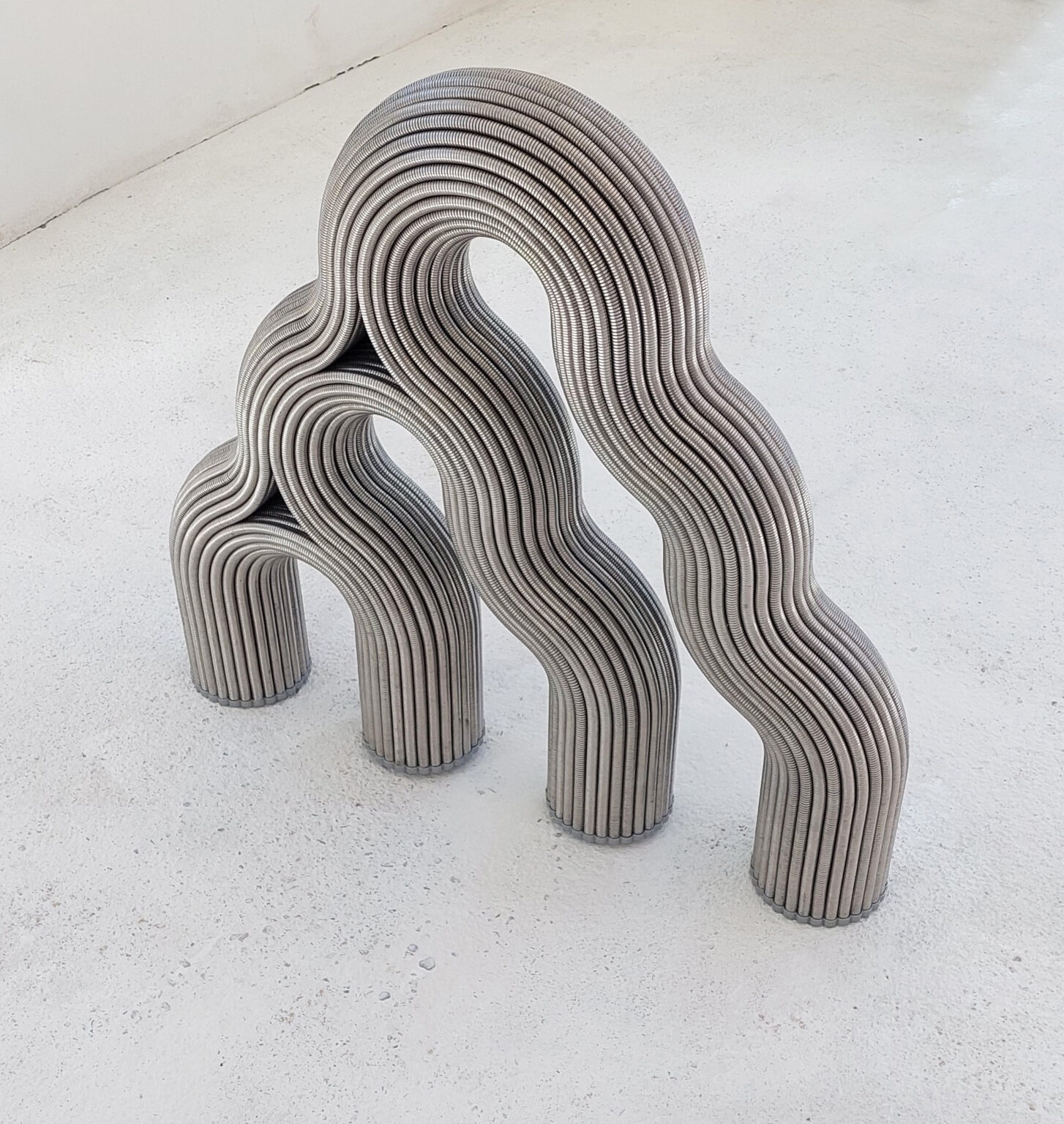FLUXsculpture – Handcrafted Organic Steel Form Inspired by Nature’s Flow | designboom shop