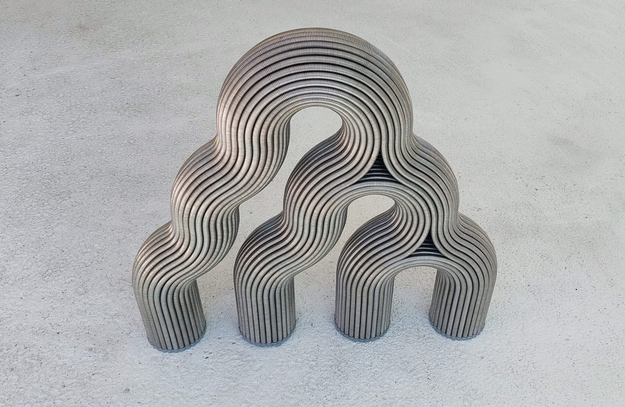 FLUXsculpture – Handcrafted Organic Steel Form Inspired by Nature’s Flow | designboom shop