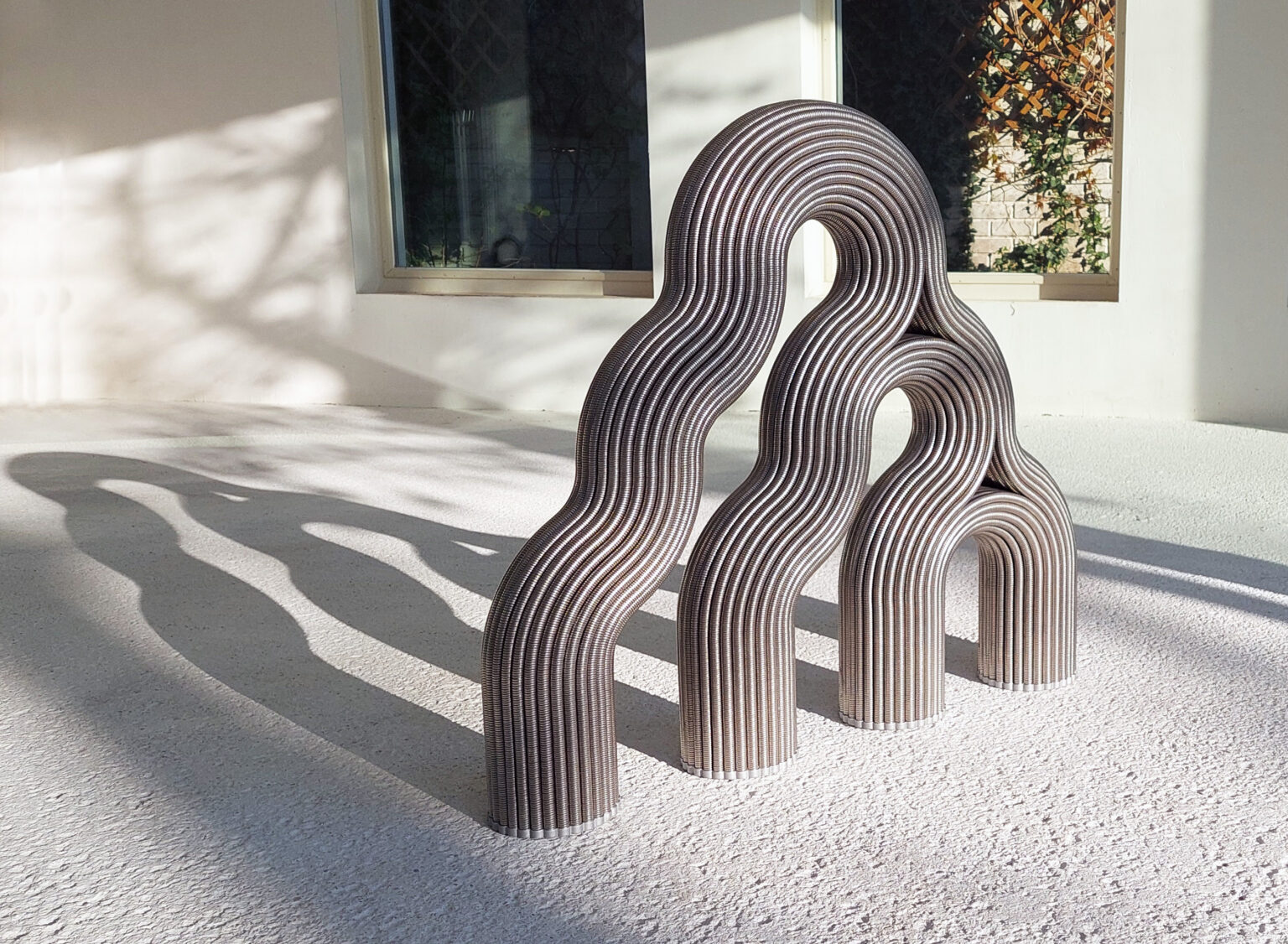 FLUXsculpture – Handcrafted Organic Steel Form Inspired by Nature’s Flow | designboom shop
