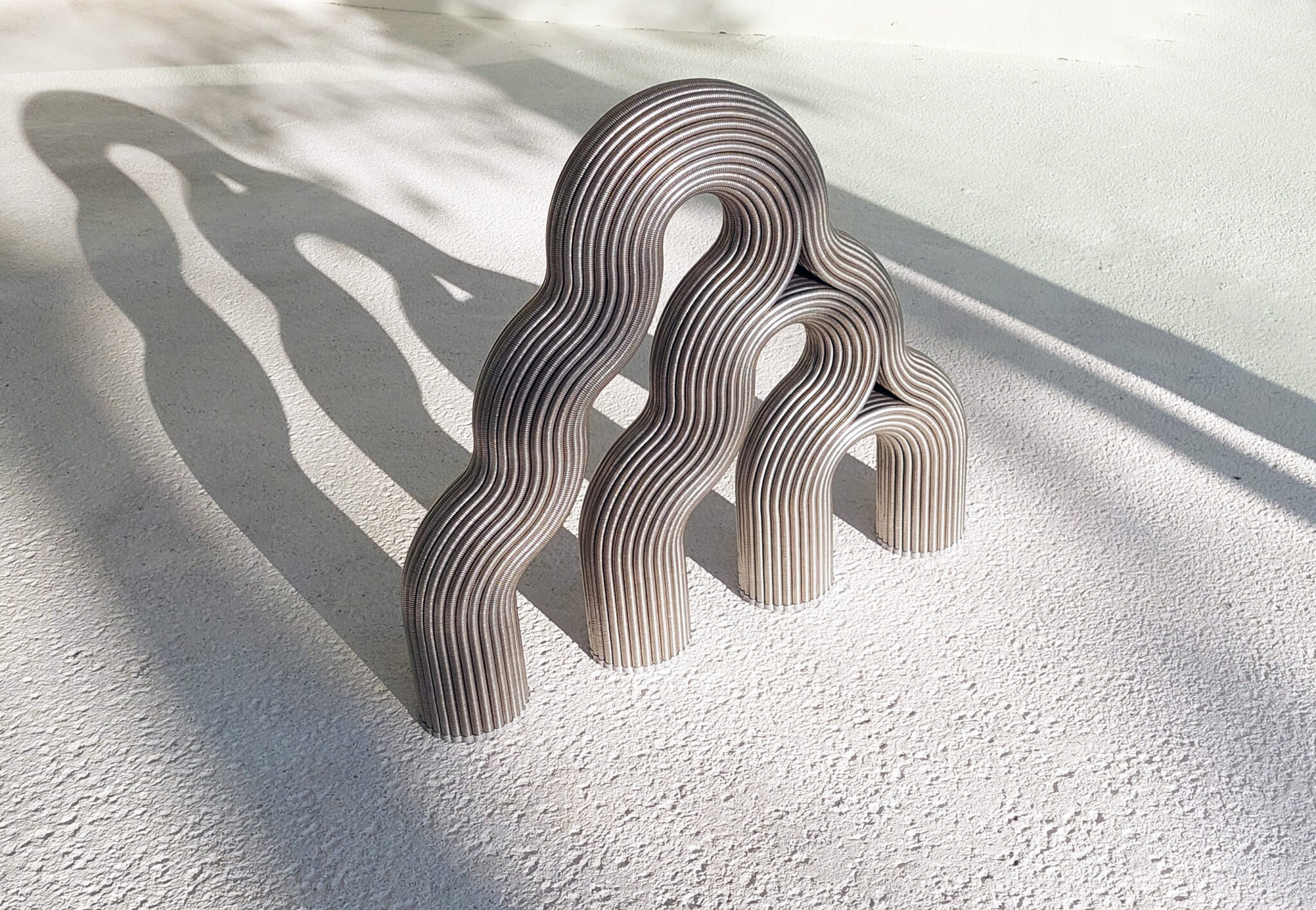 FLUXsculpture – Handcrafted Organic Steel Form Inspired by Nature’s Flow | designboom shop