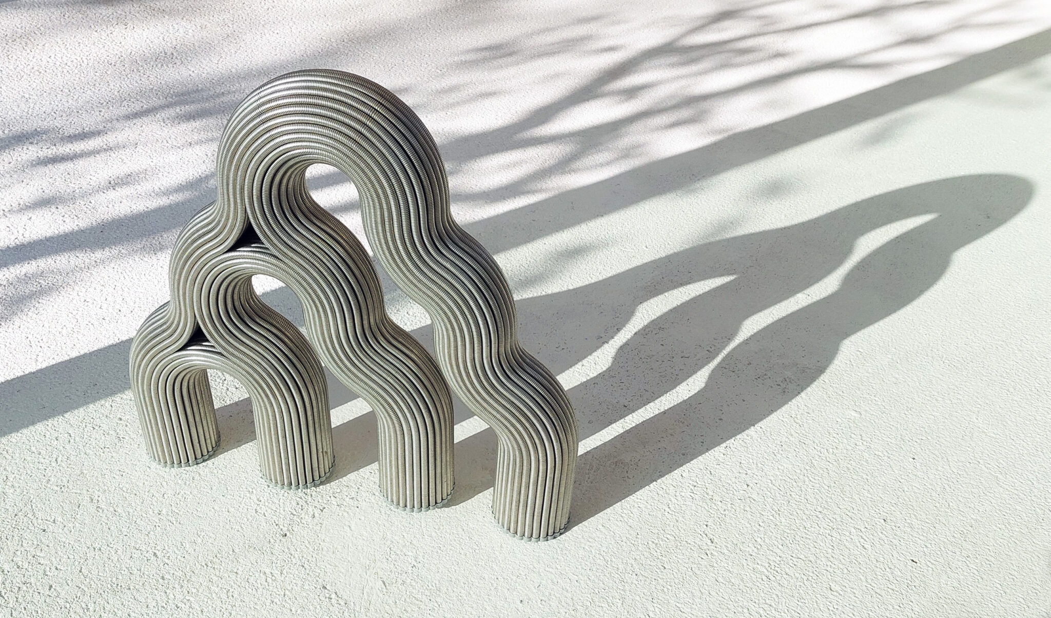 FLUXsculpture – Handcrafted Organic Steel Form Inspired by Nature’s Flow | designboom shop