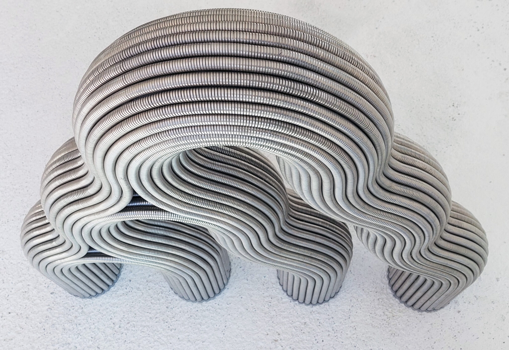 FLUXsculpture – Handcrafted Organic Steel Form Inspired by Nature’s Flow | designboom shop