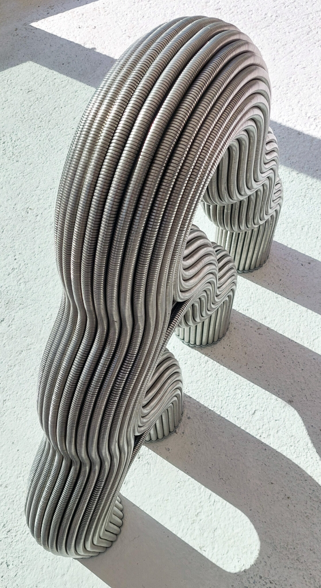 FLUXsculpture – Handcrafted Organic Steel Form Inspired by Nature’s Flow | designboom shop