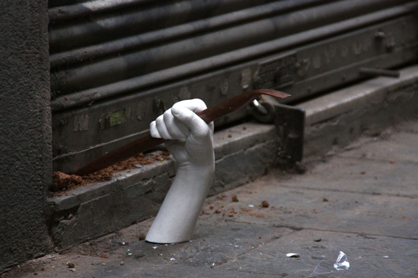 metaphorical street hand intervention in barcelona
