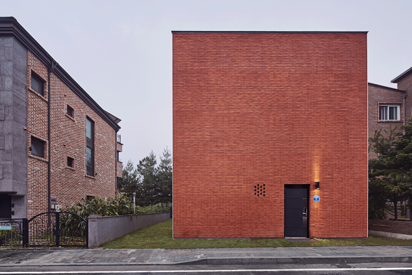 archiworkshop's 'red square house' is two homes in one