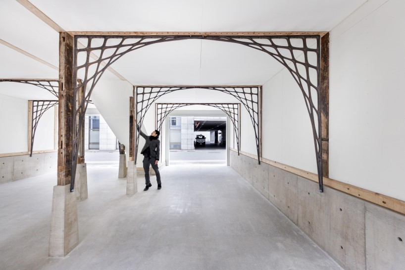 rei mitsui architects adds arched-frame structure to building ...