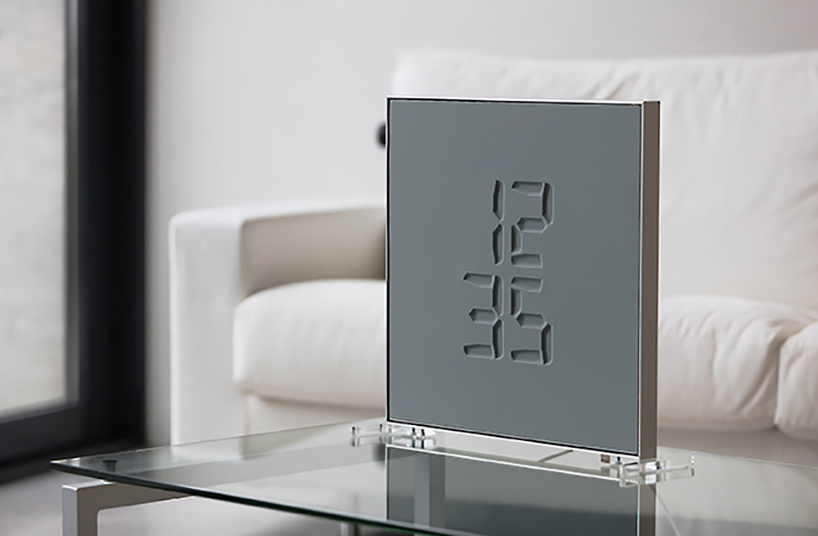 ETCH clock engraves time in a sculptural way