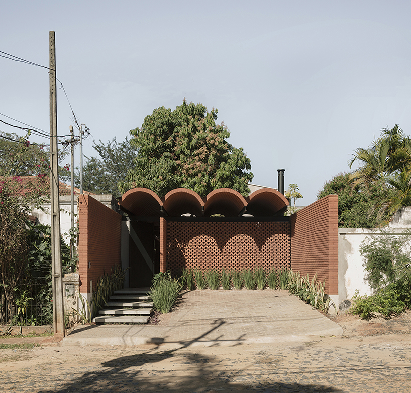 compressed earth blocks and a vaulted roof complete intermediate house ...