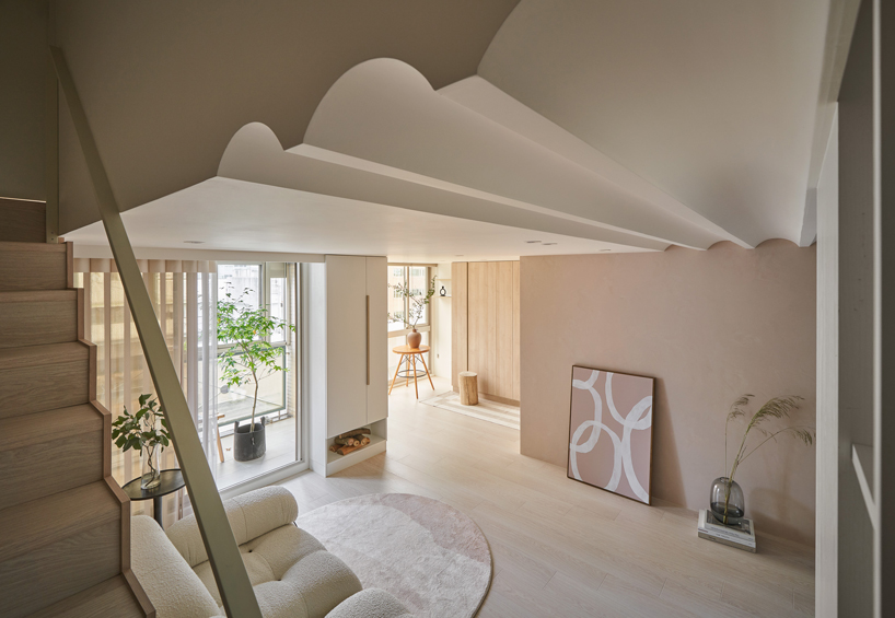 tiny apartment in taiwan expands upwards for space saving and optimization