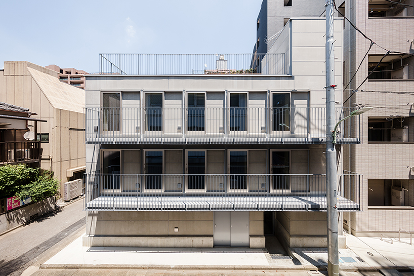 tsukada architects uses concrete & steel to build minimal company ...