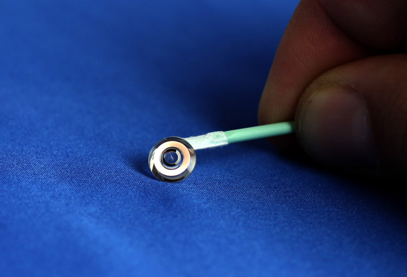 a telescope for your eye: optical zoom contact lenses