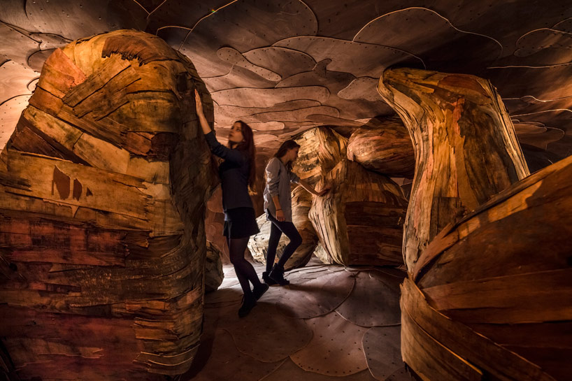 multisensory wooden walk-in cave by henrique oliveira