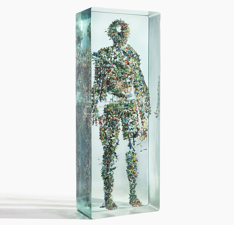dustin yellin confines collaged figures in layers of glass