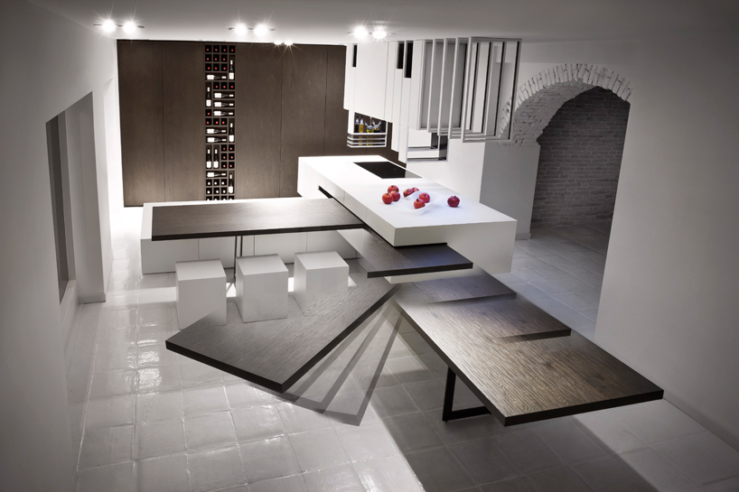 the cut by alessandro isola is a reconfigurable kitchen with sliding units