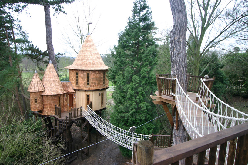british family is living the highlife in treehouses by blue forest