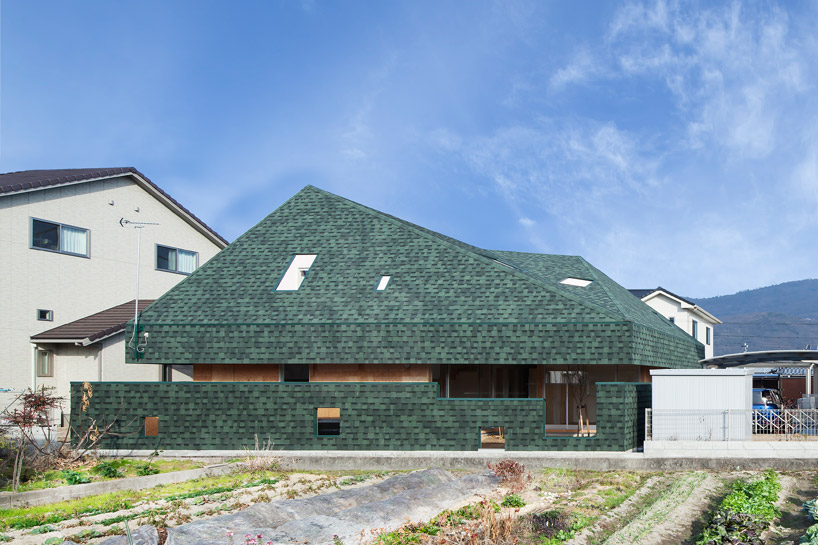 y+M design office caps off beret house with triangulated roof