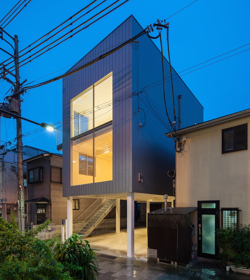 pilotis used to elevate TOFU architects' highway adjacent dwelling