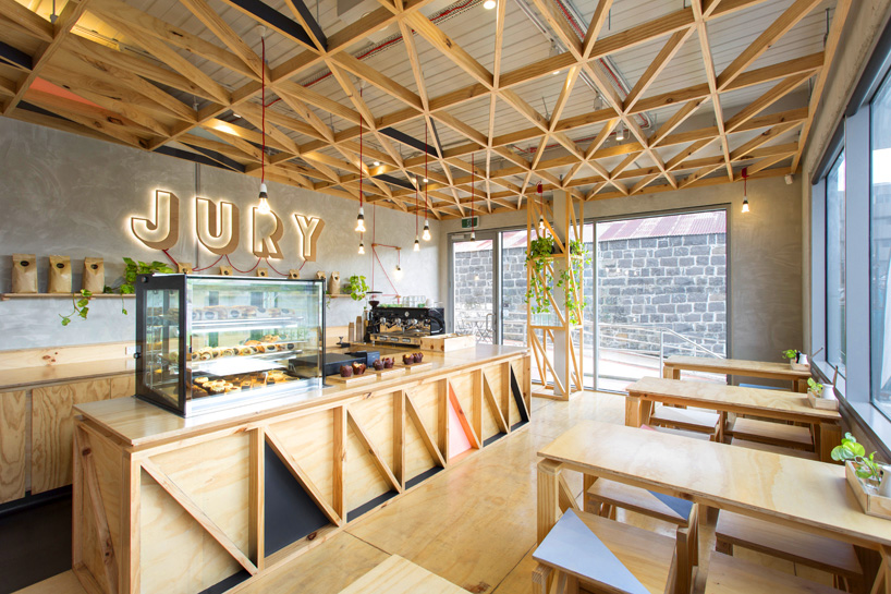 jury cafe by biasol design studio constructed from a mix of raw materials