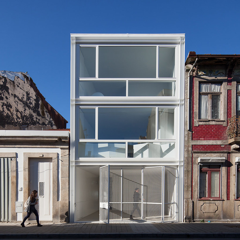 porto row-house has concealed doors and dynamic shutters