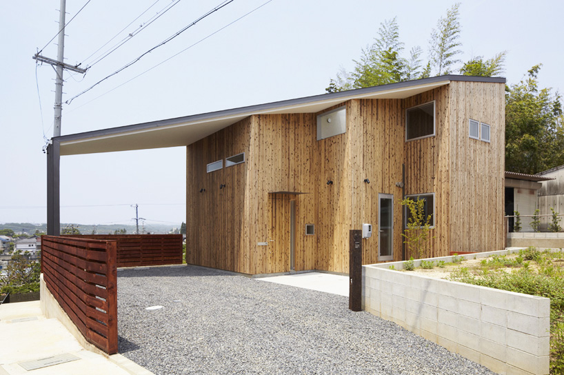 roote contains flame house beneath a large angled canopy