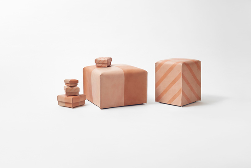 nendo explores the natural wear of leather with suntan patterns