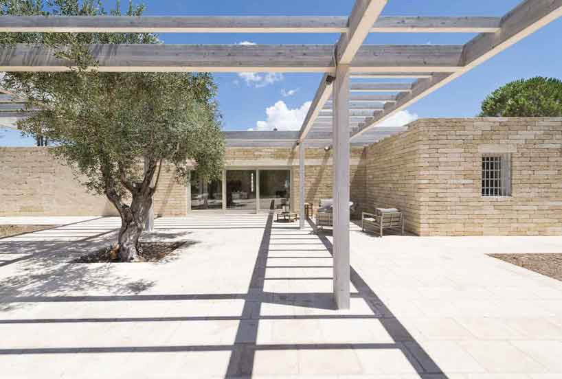 massimo iosa ghini completes eco-sustainable villa in salento