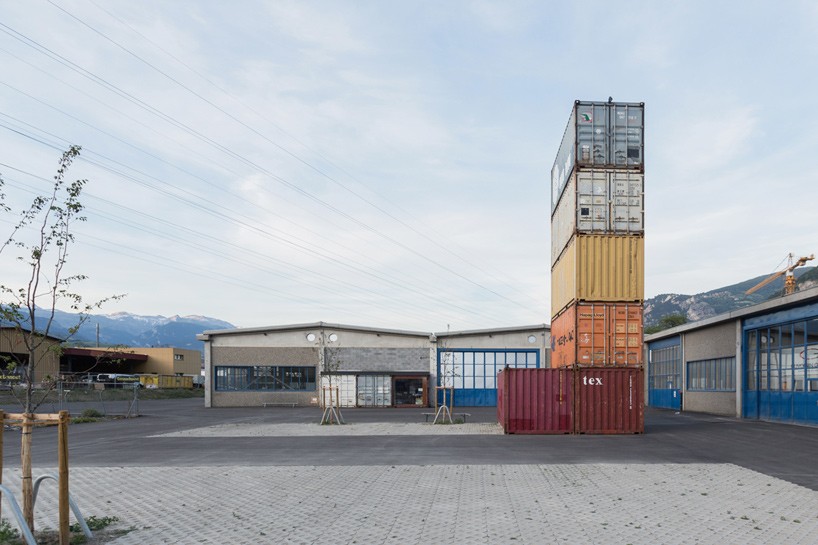 shipping container music venue by savioz fabrizzi architectes