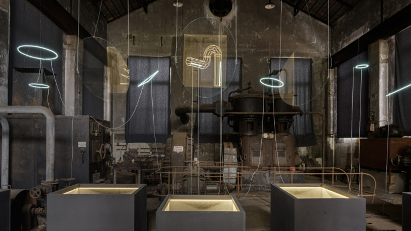 luminaries installation of neon lights and reflection on glass by ...