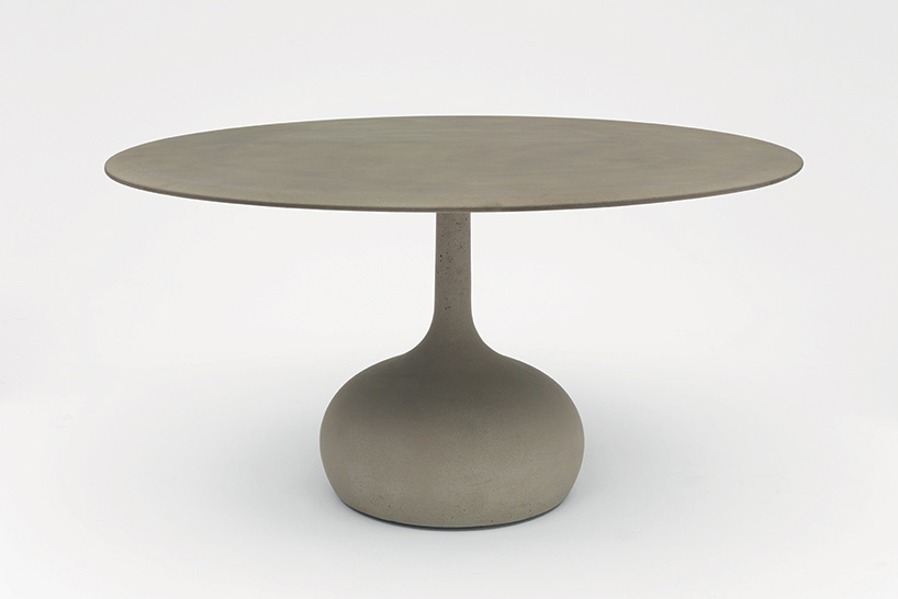 buratti architetti explores concrete in saen table for alias