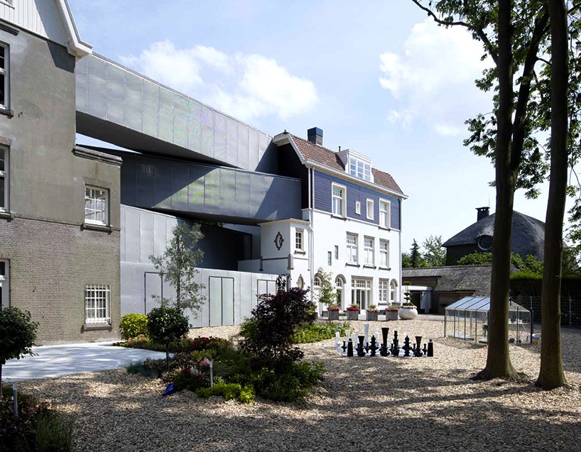 bureau SLA links two buildings completes dutch glass museum