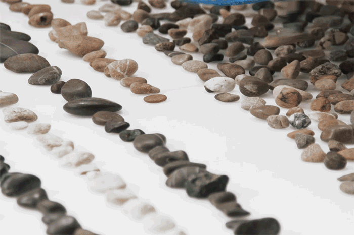 robotic rock installation sorts stones based on their geological age