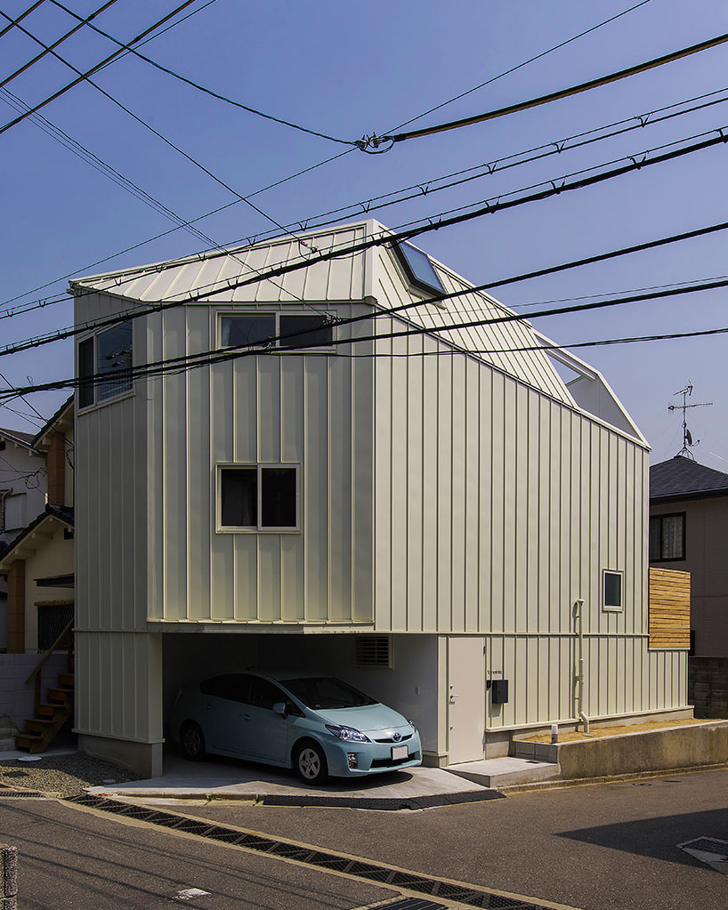 angular residence by coo planning sits on a corner plot