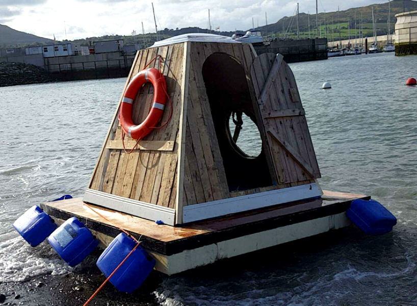aodh design constructs small floating pod out of abadoned building ...