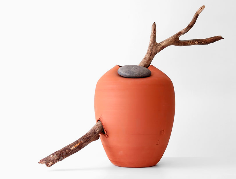 martín azúa's vases are tenderly interrupted by nature