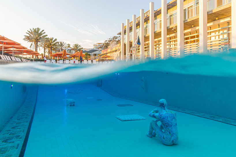 underwater art show is submerged in a swimming pool in LA