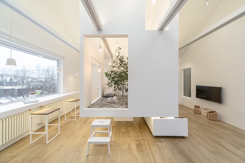 ruetemple adds multi-functional cube to living room