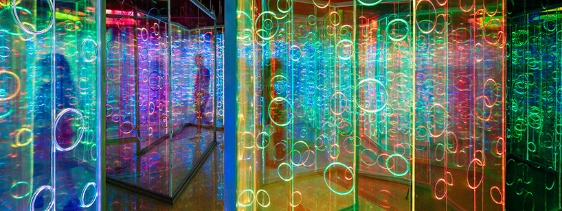 rainbow-hued light labyrinth by brut deluxe forms an immersive infinity ...