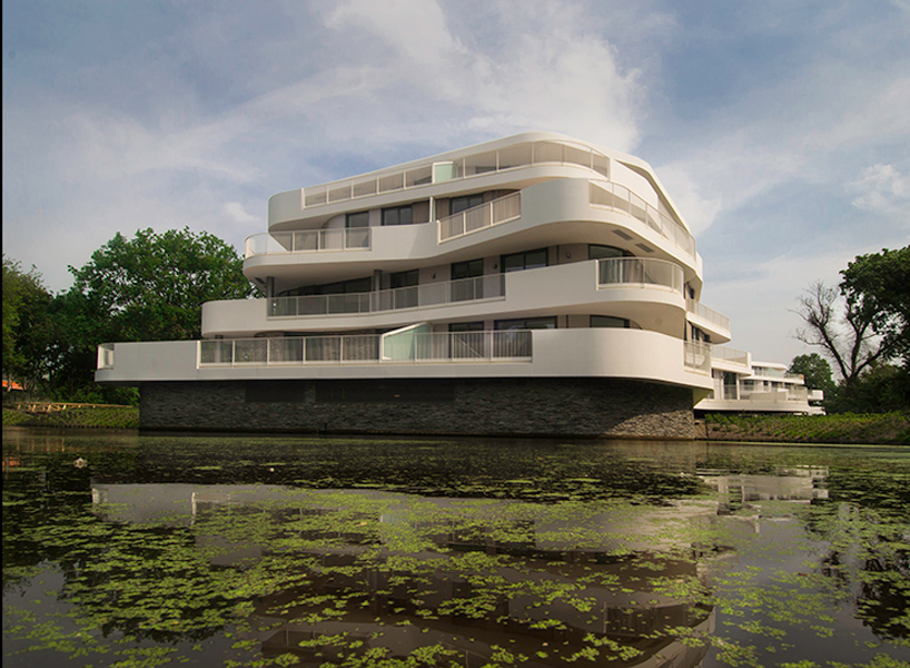 BREIN architects' organic-shaped villas are set in a park-like site in ...