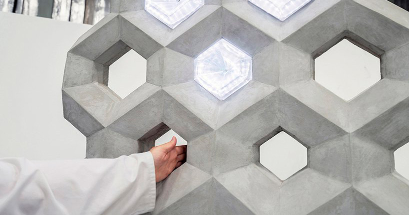 the world's first 'smart concrete wall' is activated by the touch of a hand