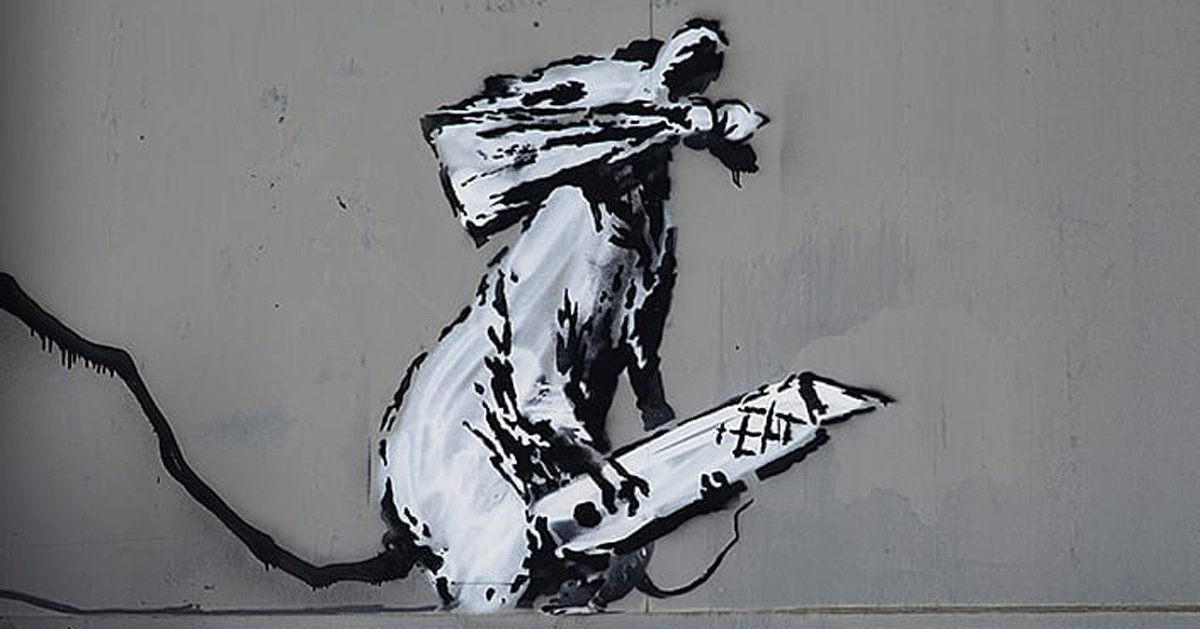 banksy confirms authorship of several new murals across paris taking ...