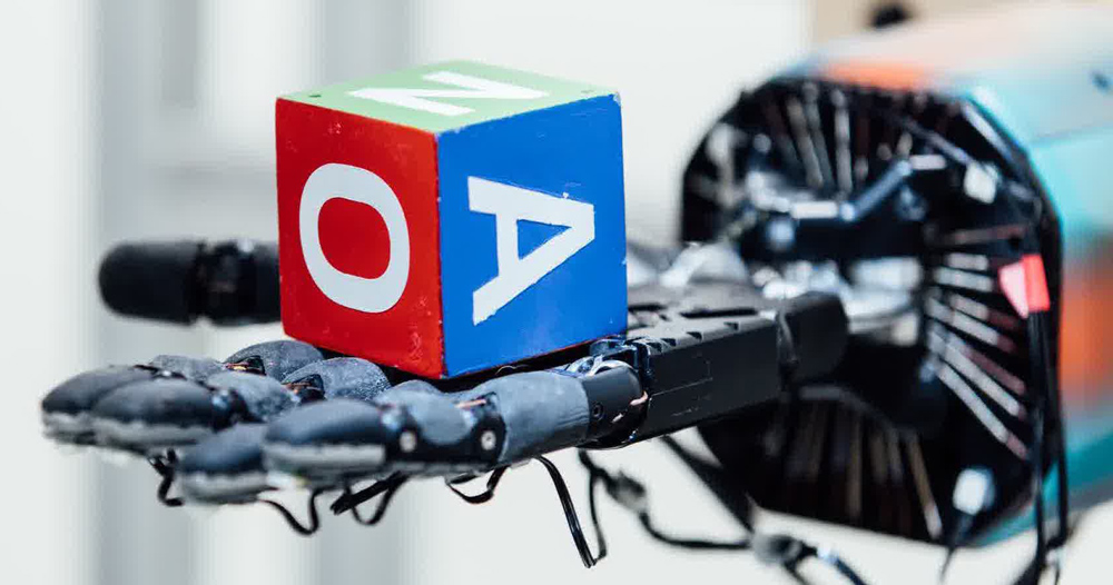 AI-driven robot learns how to rotate a cube with the dexterity of a human