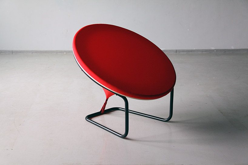 gaudutė žilytė's red dot chair is reminiscent of works by anish kapoor