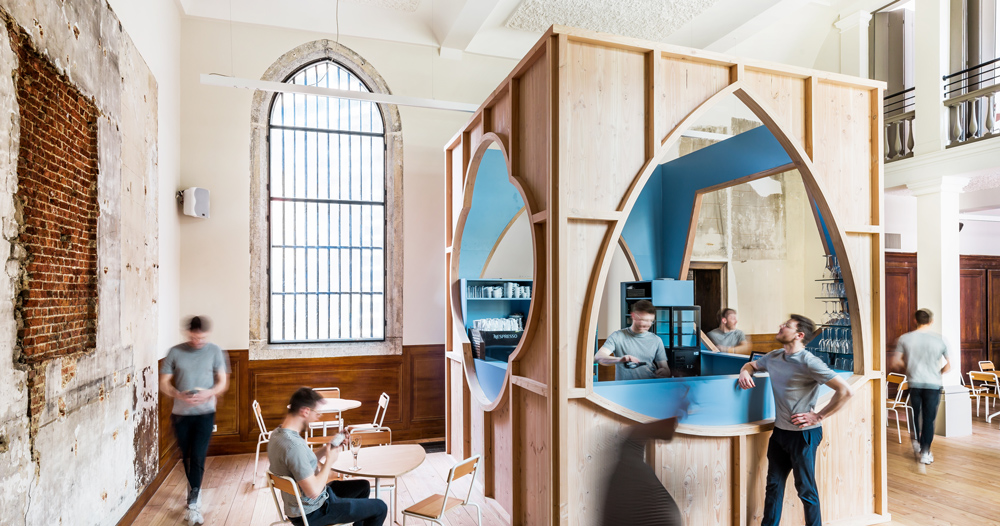 a contemporary gothic bar occupies belgium's largest cathedral