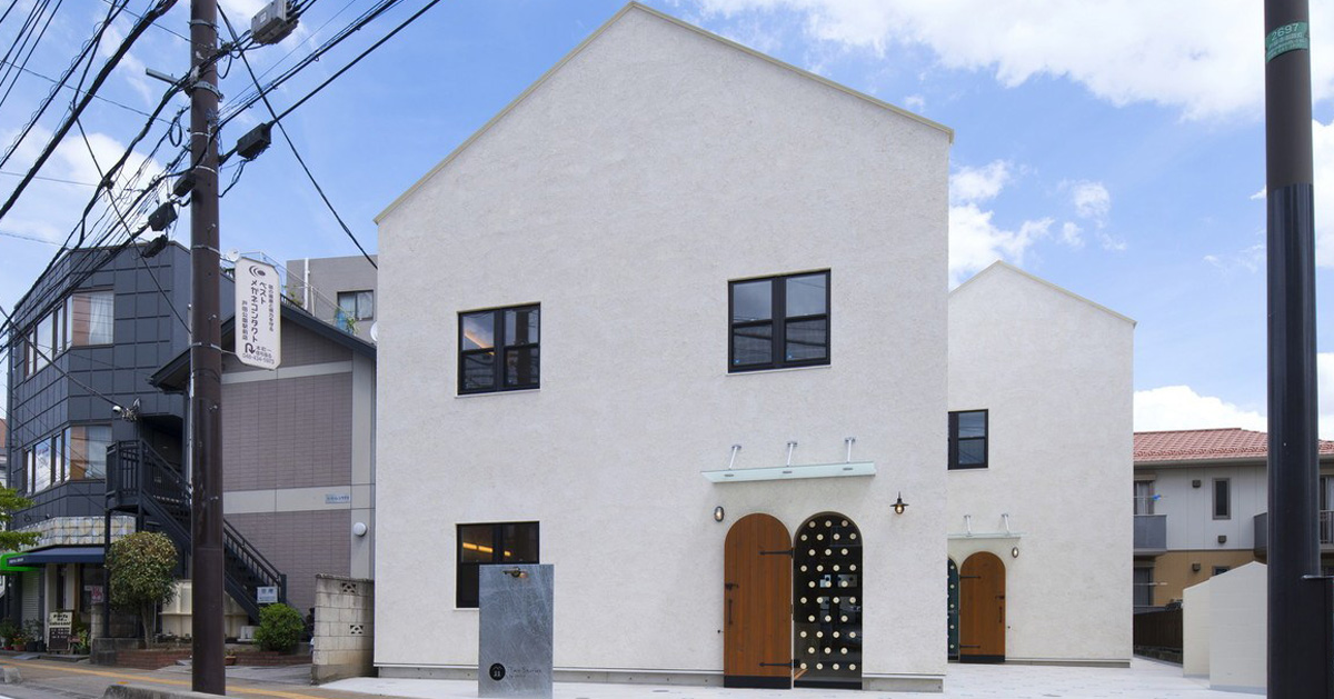 gabled roofs and a dotted pathway add homelike feel to organic design's ...