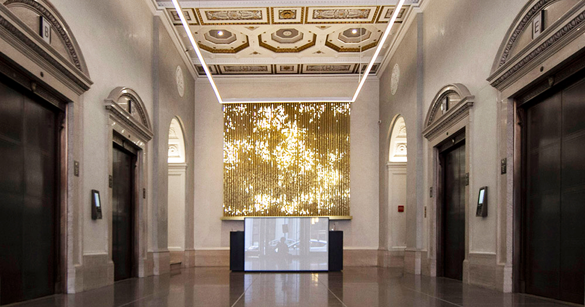 SOFTlab creates light organ by layering an array of LED-filled brass pipes