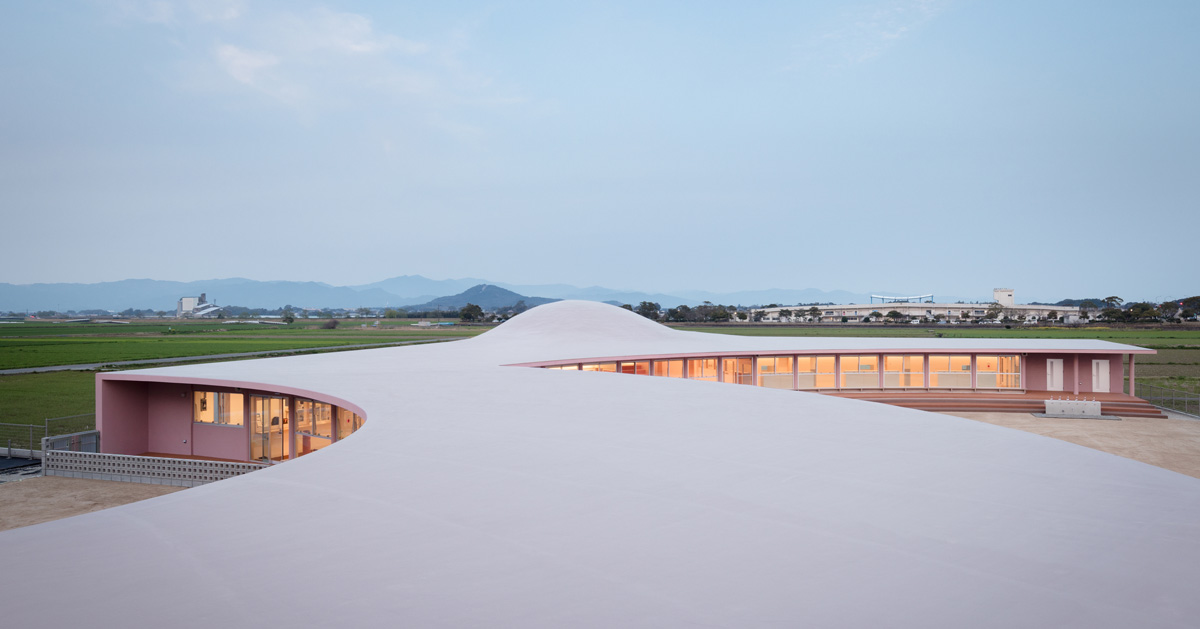 ryuji fujimura tops subaru nursery school in japan with curved concrete ...