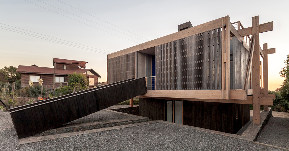a detached latticed structure wraps around tacna house by par arquitectos