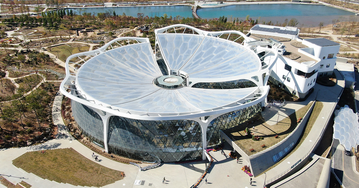 seoul botanic park incorporates a flower-shaped roof and triangular ...